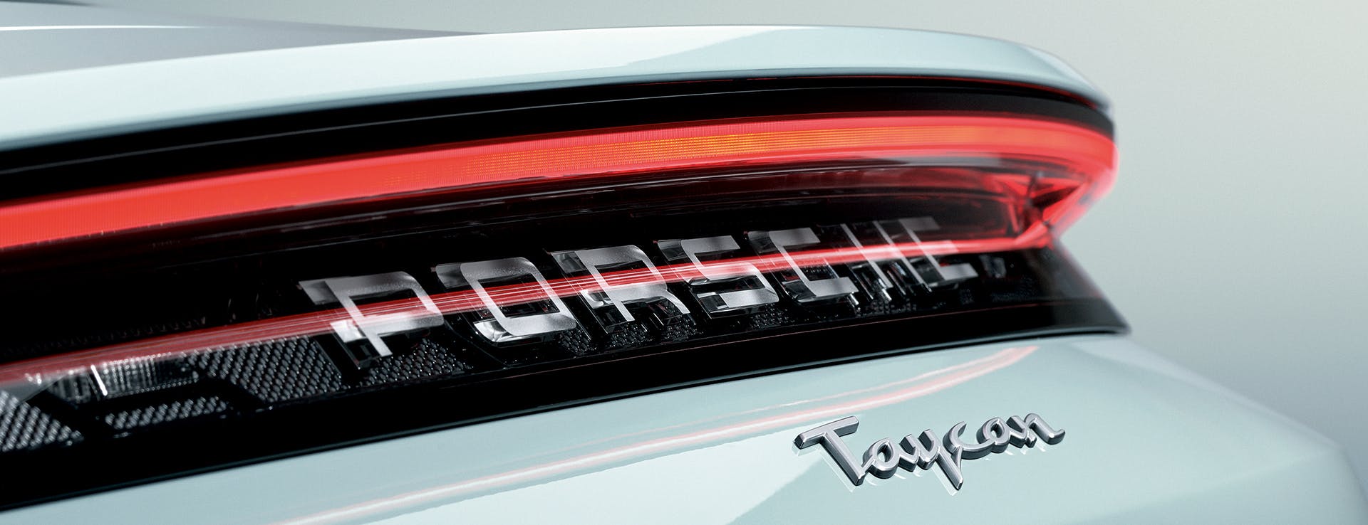 How do you pronounce Porsche Taycan